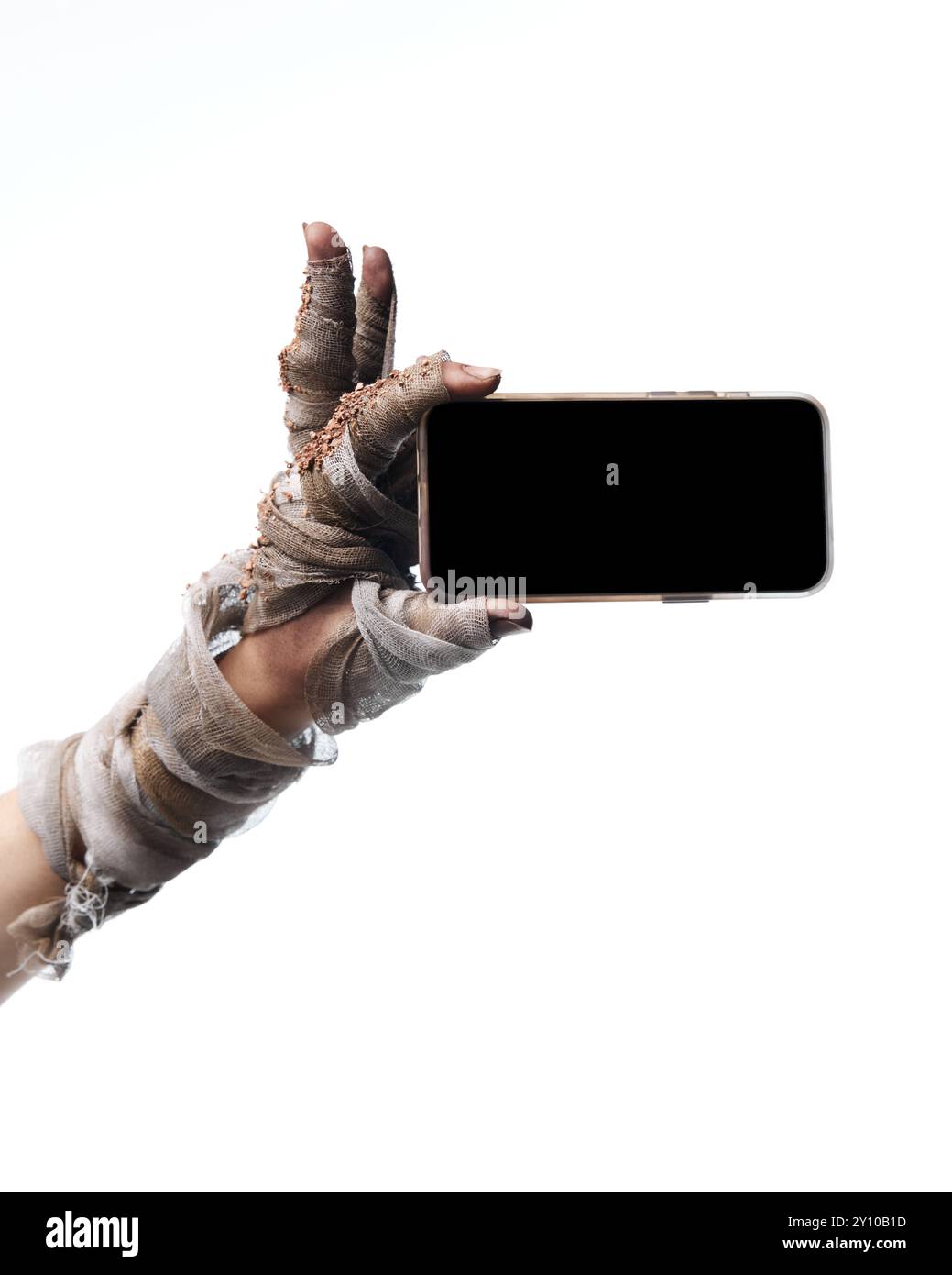Spooky zombie's hand holding modern smartphone with black screen ...