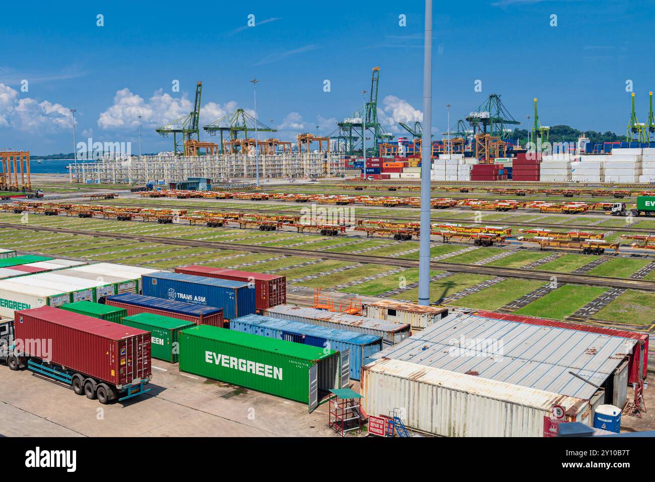 Singapore - Jun 13 2024: Aerial view of container terminal, cranes and ...
