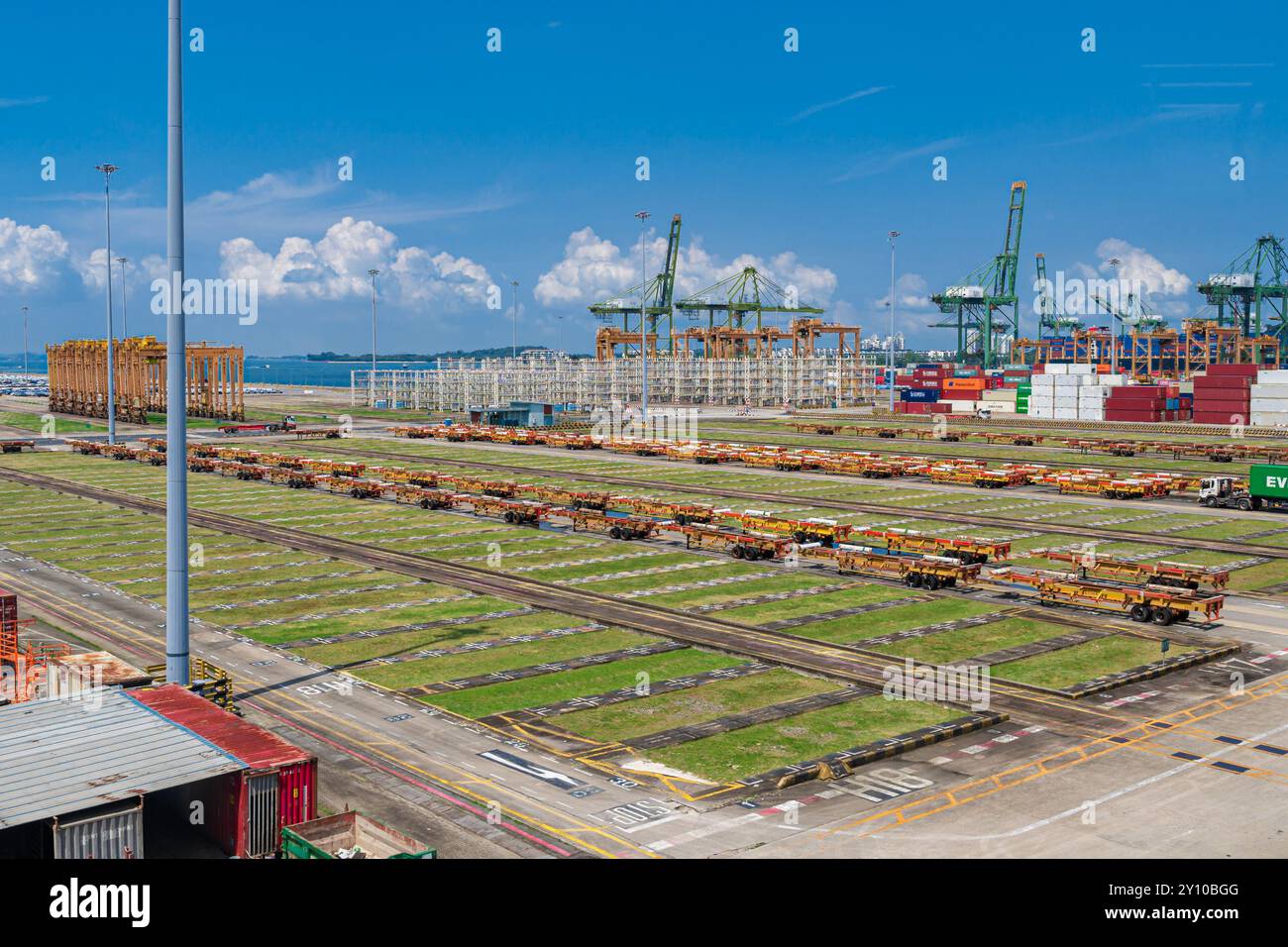 Singapore - Jun 13 2024: Aerial view of container terminal, cranes and ...