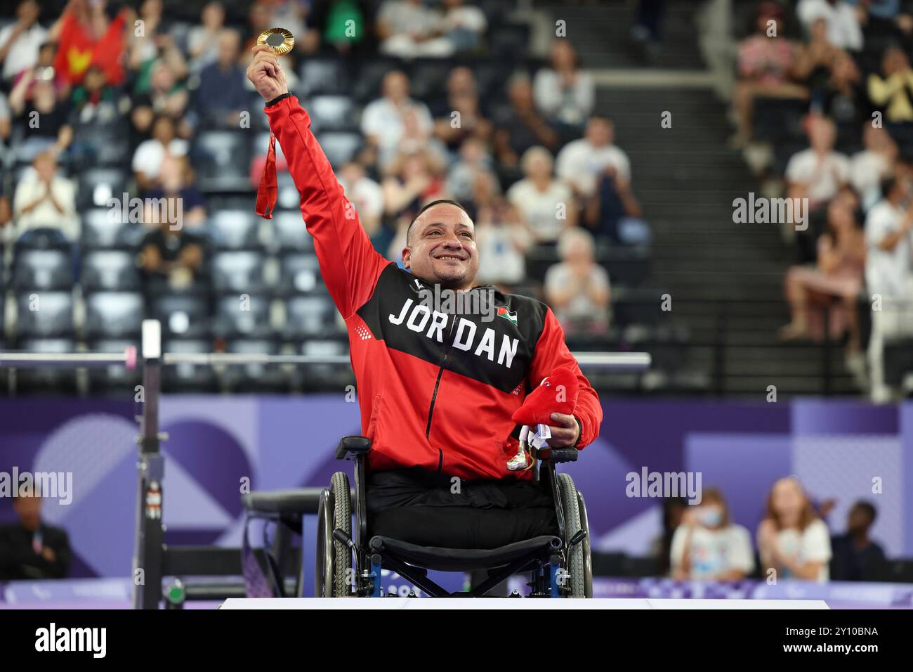 Jordan's Omar Sami Hamadeh Qarada poses at the medal ceremony after ...