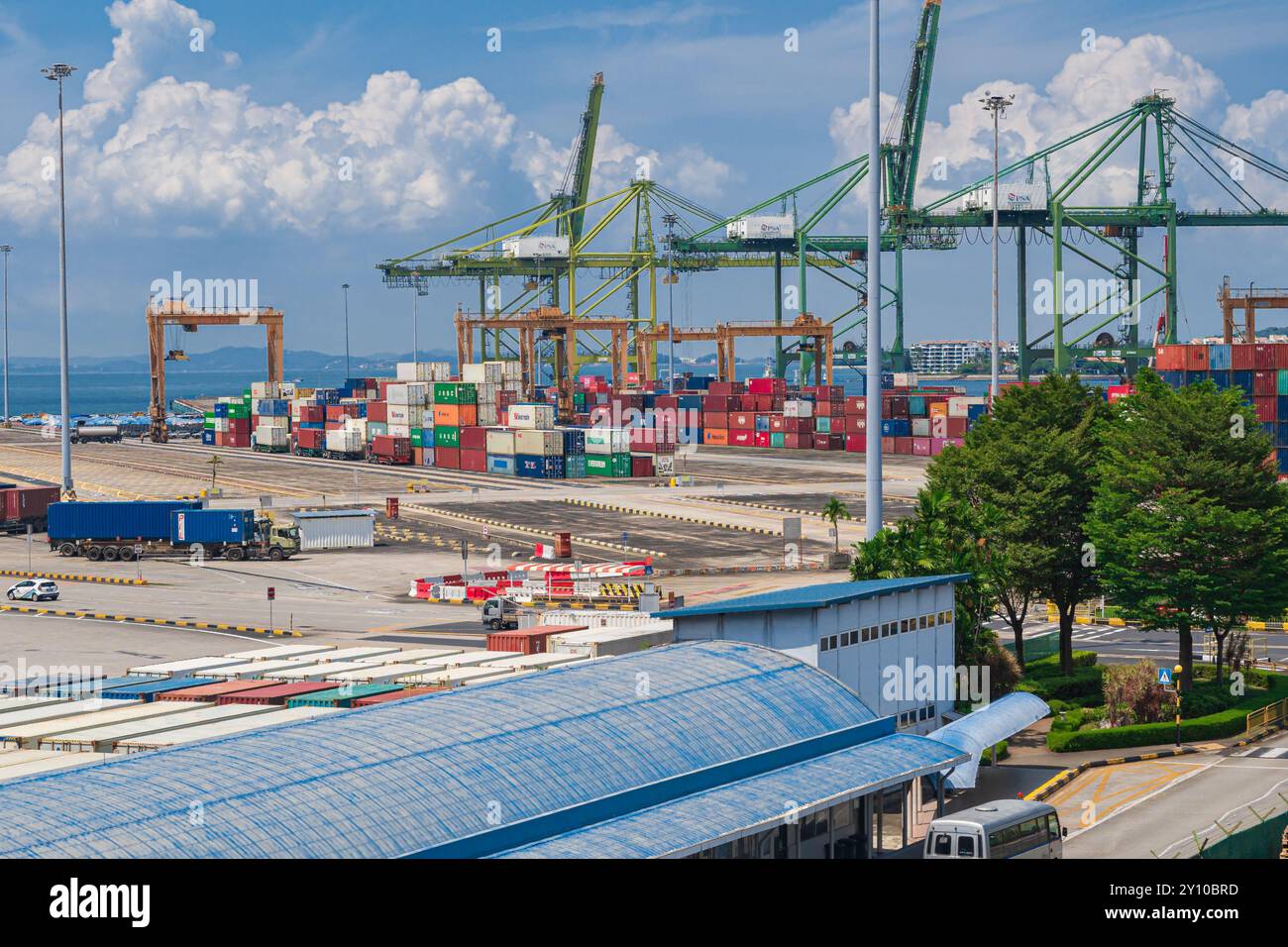 Singapore - Jun 13 2024: Aerial view of container terminal, cranes and ...