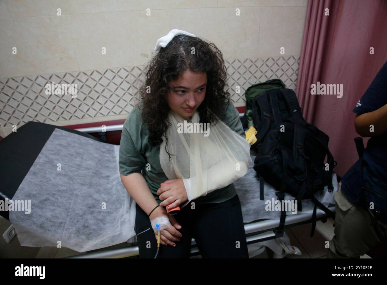 Nablus, Palestine. 04th Sep, 2024. A foreign activist seen receiving ...