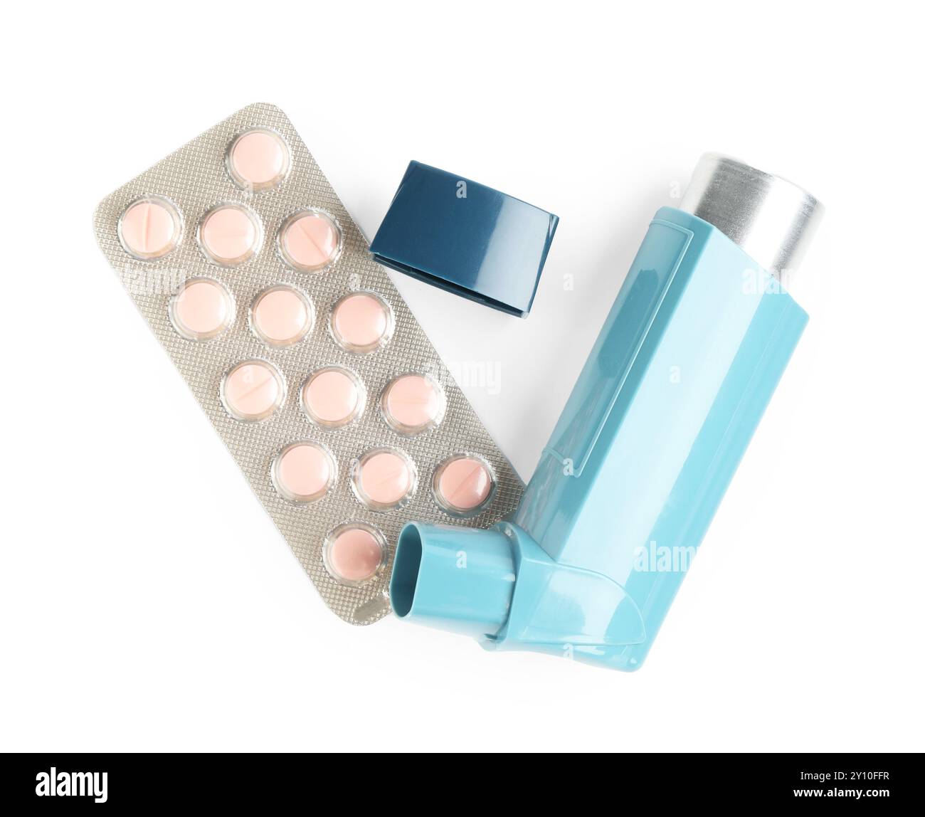 Asthma treatment. Inhaler and pills isolated on white, top view Stock ...