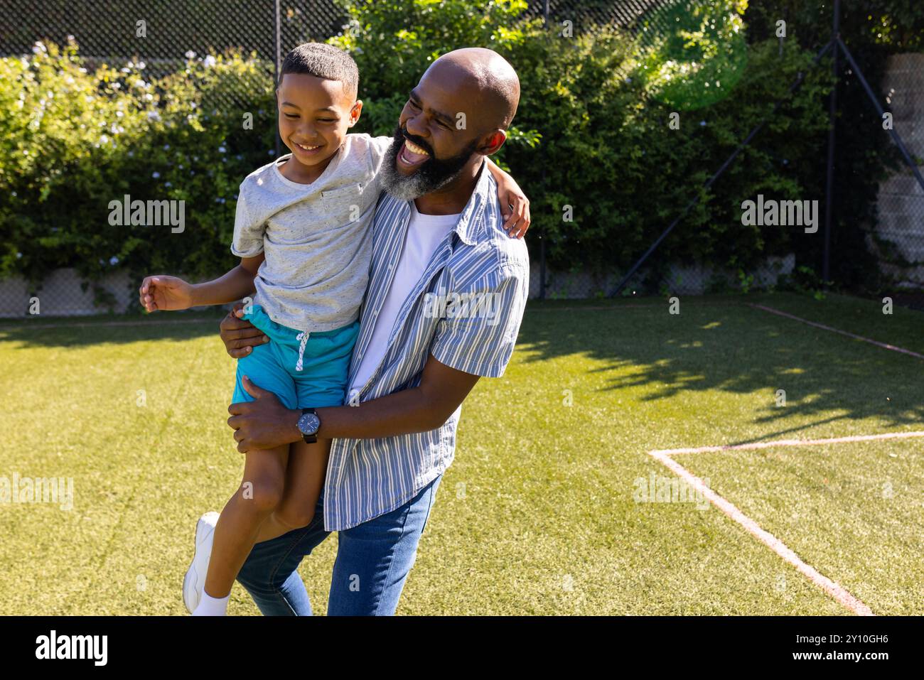 Grandparents teaching grandson play hi-res stock photography and images ...