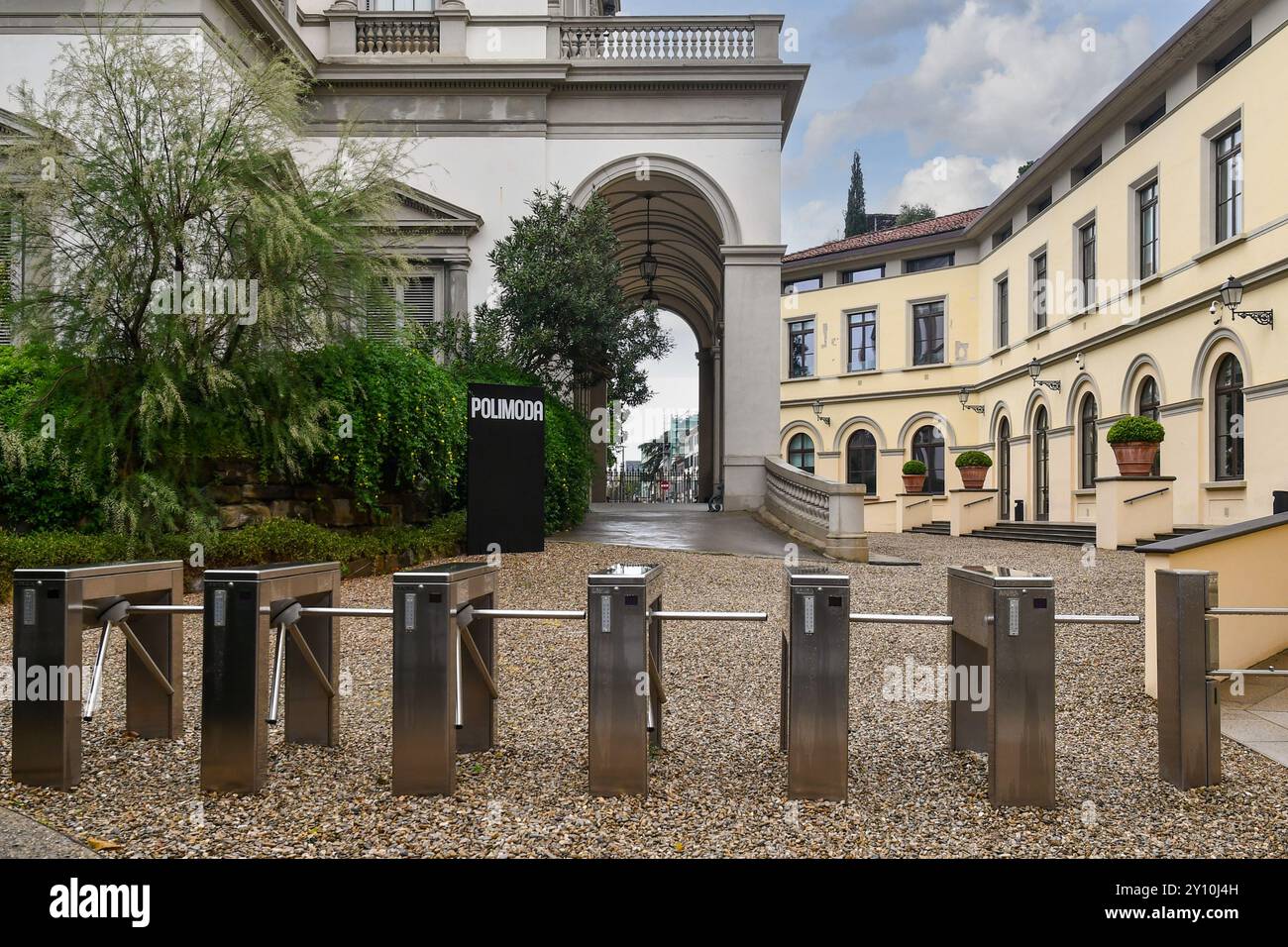 Entrance with turnstiles to the prestigious Polimoda fashion university ...
