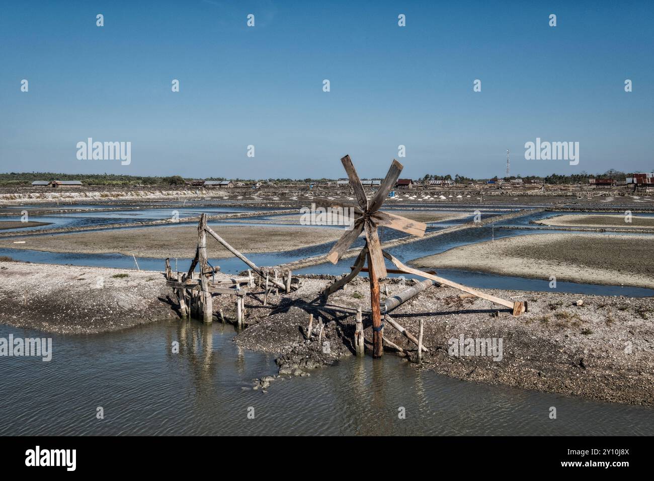 Collecting salt in indonesia hi-res stock photography and images - Alamy