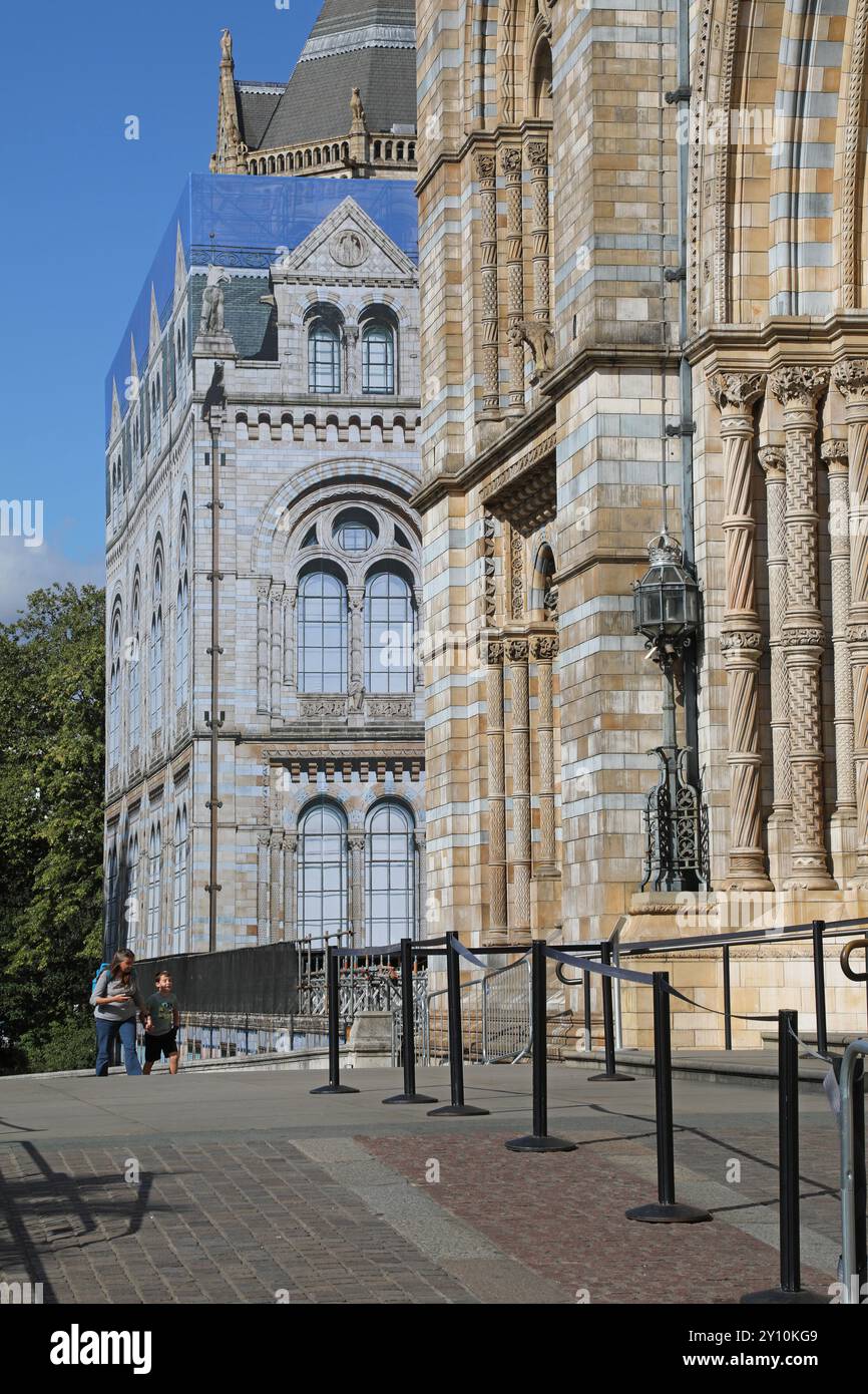 London's Natural History Museum is partially hidden by scaffolding ...