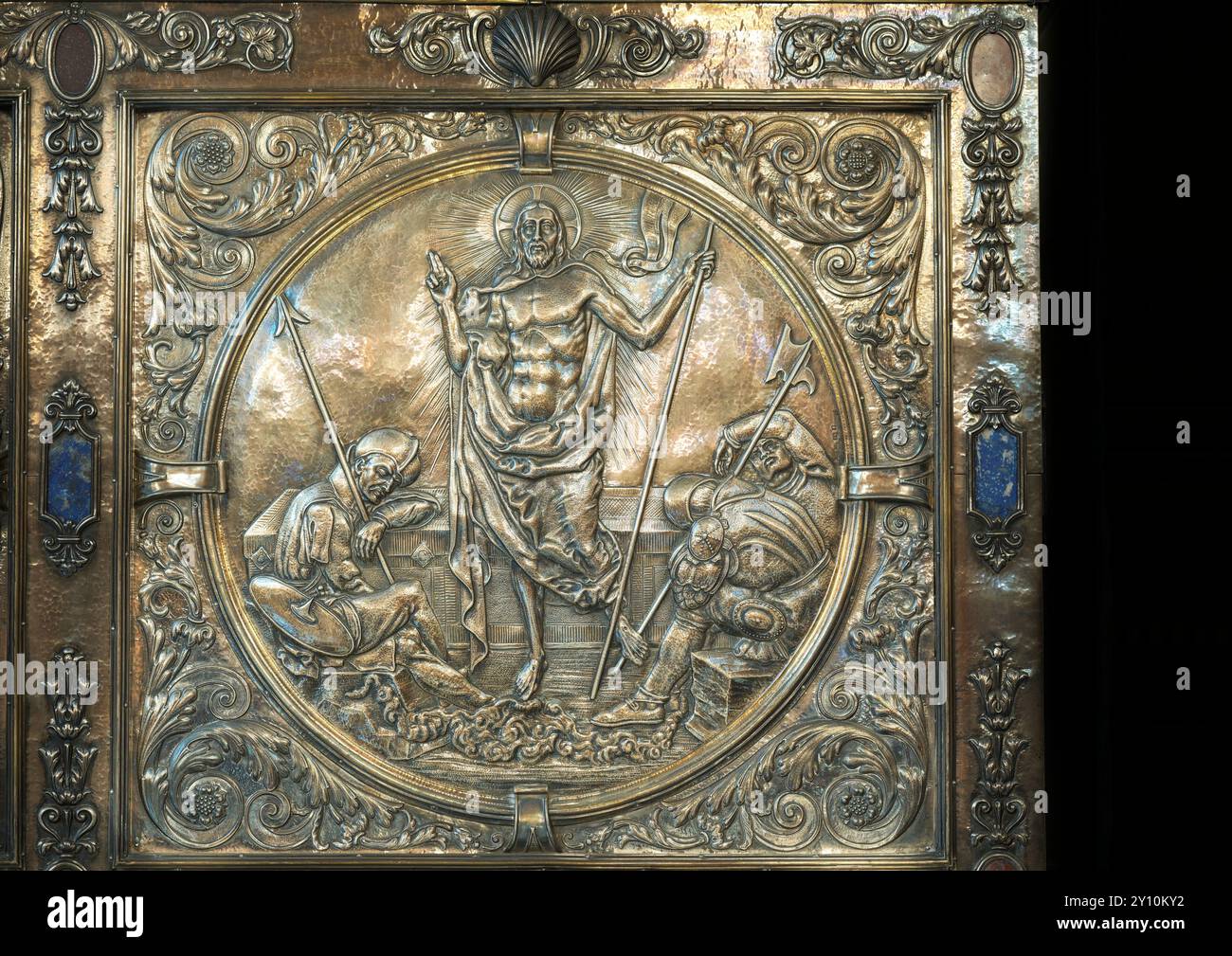 Brass engraving, of Jesus Christ rising from the dead, on the altar in ...