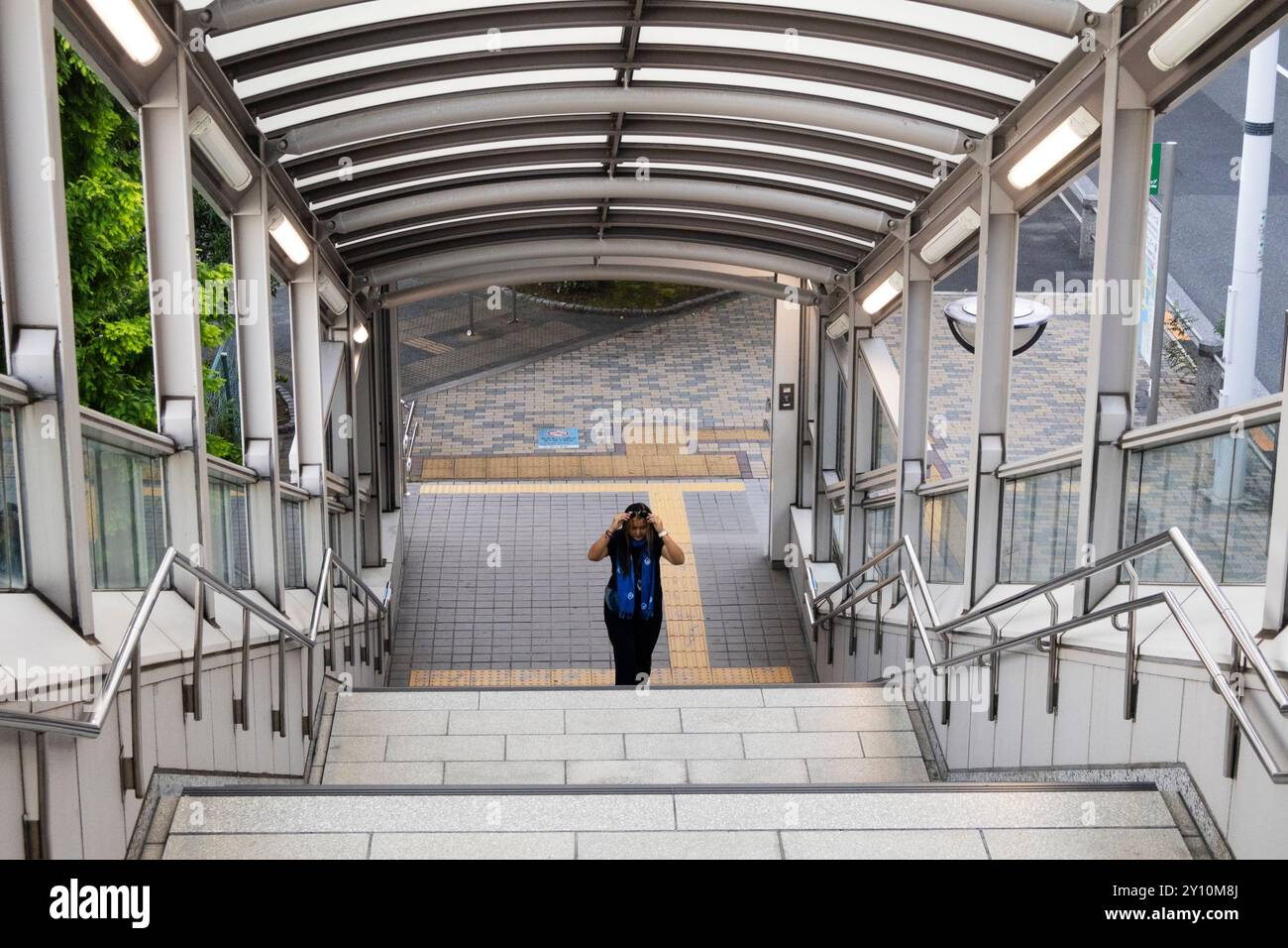 Travelers thai women travel visit journey walking on stairs to Kokusai ...