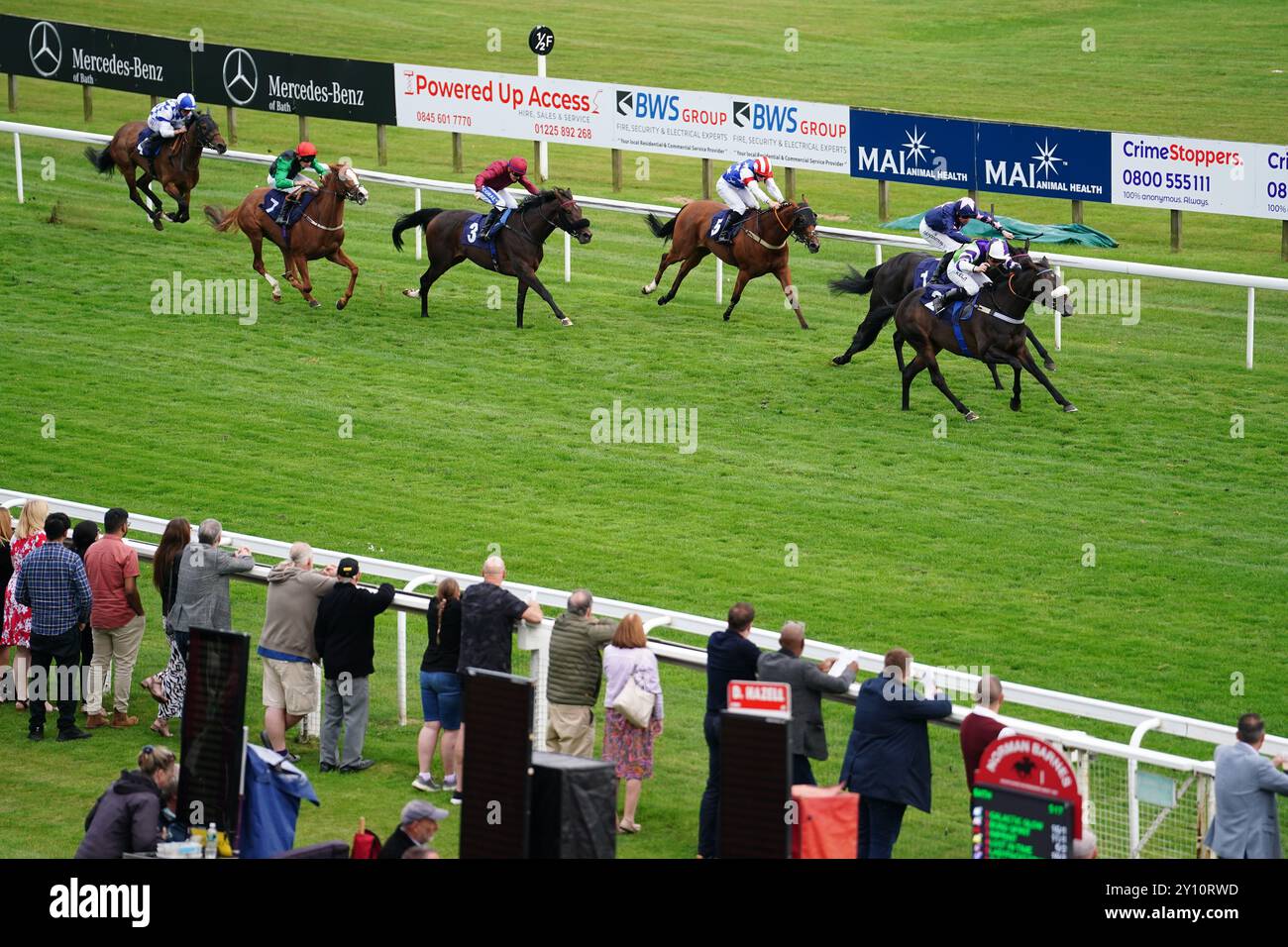 Miss Dolly Rocker ridden by Jockey Jason Watson (right) on their way to ...