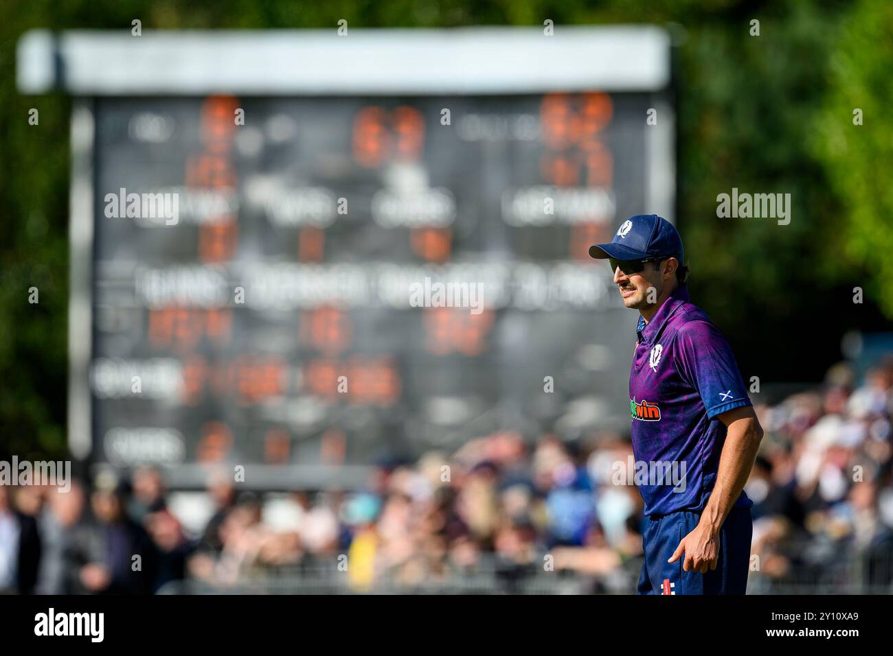 Scotland's Christopher Greaves watches from the boundary during the ...