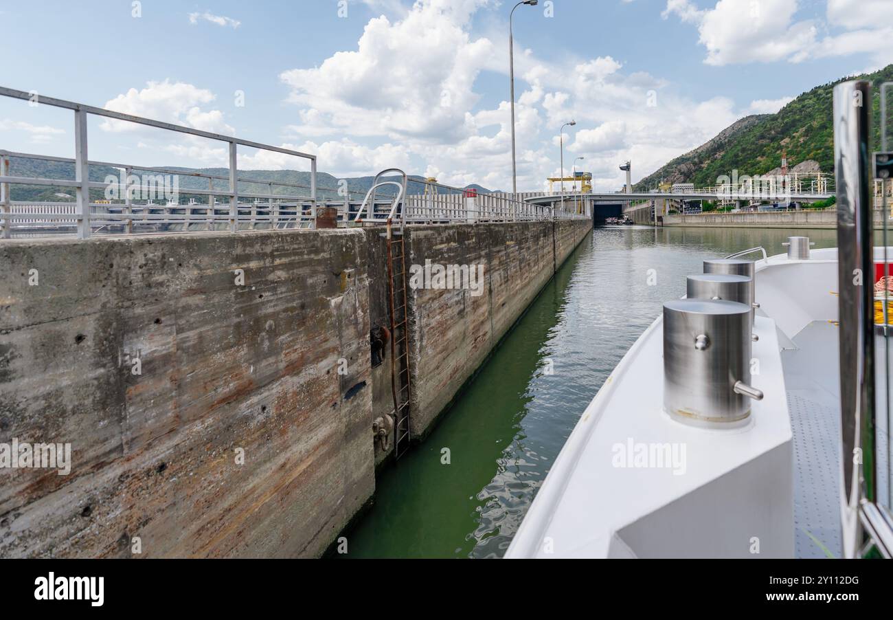 River Lock Entrance with Concrete Walls and Mountain Backdrop Stock ...