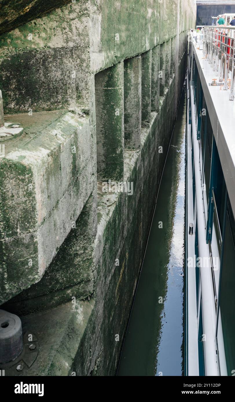 Narrow Lock Chamber with Algae-Covered Walls and Cruise Ship Stock ...