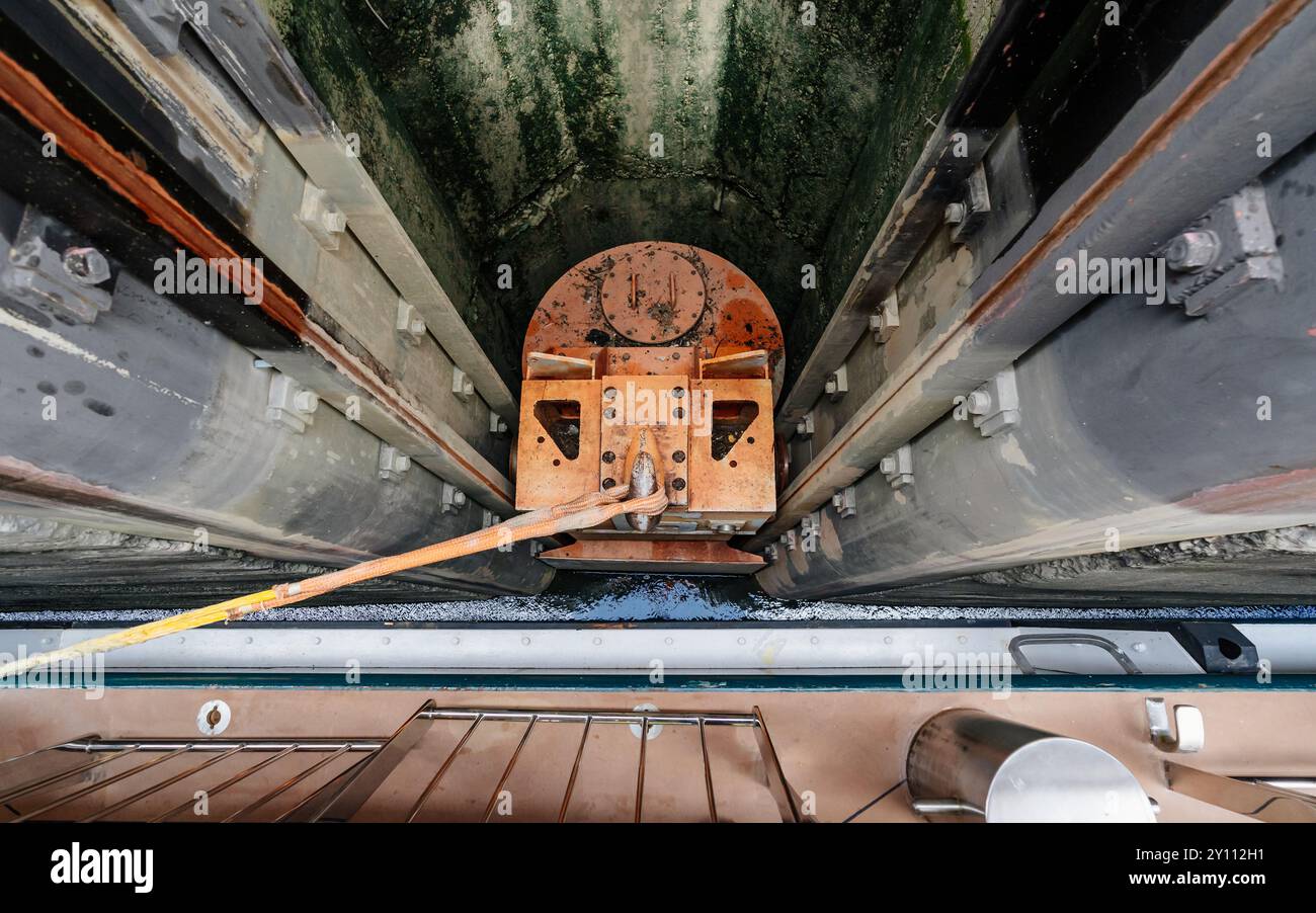 Top-down View of Ship Lock Gate Mechanism with Rusty Metal and Concrete ...