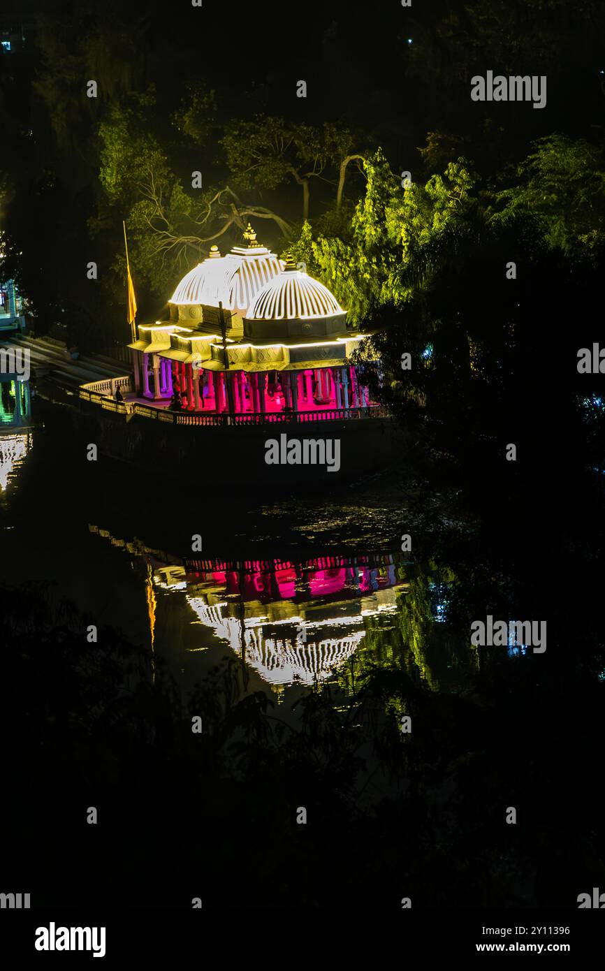 historical architecture decorated with ferry colorful lights and water ...