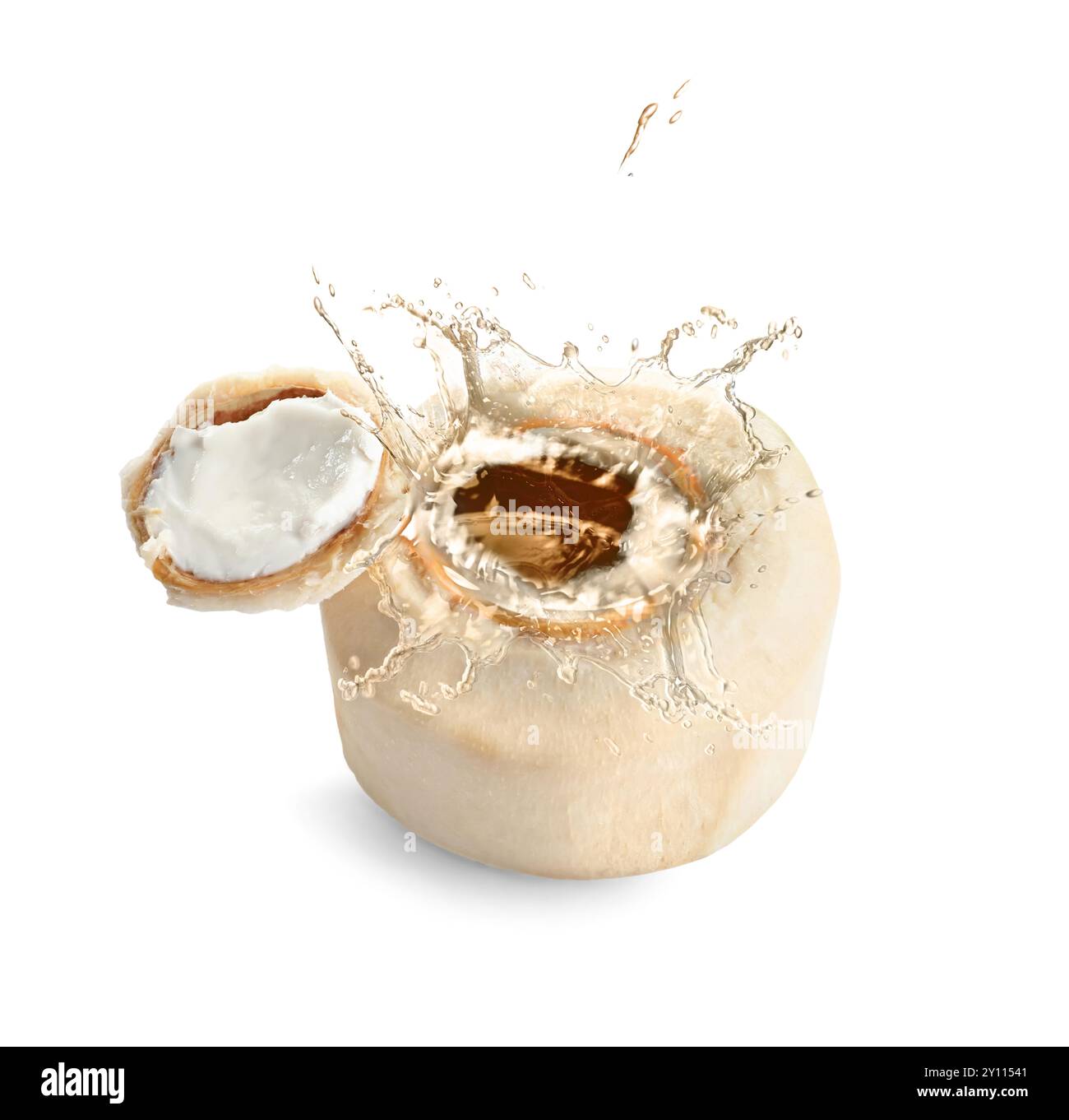 Fresh coconut water splashing in nut on white background Stock Photo ...
