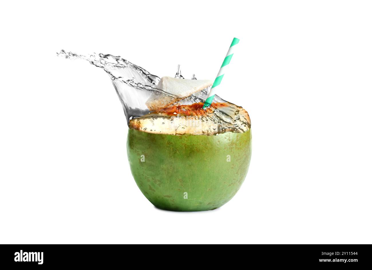Fresh coconut water splashing in nut on white background Stock Photo ...