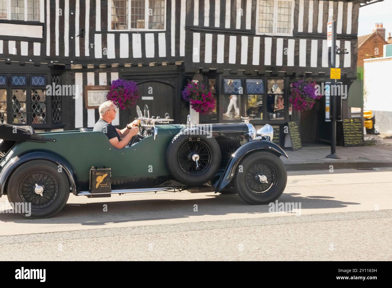 England, Kent, Tenterden, The High Street, Vintage Car Passing by the ...