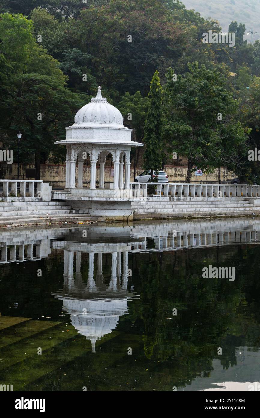 artistic city architecture with clam lake water reflection at morning ...
