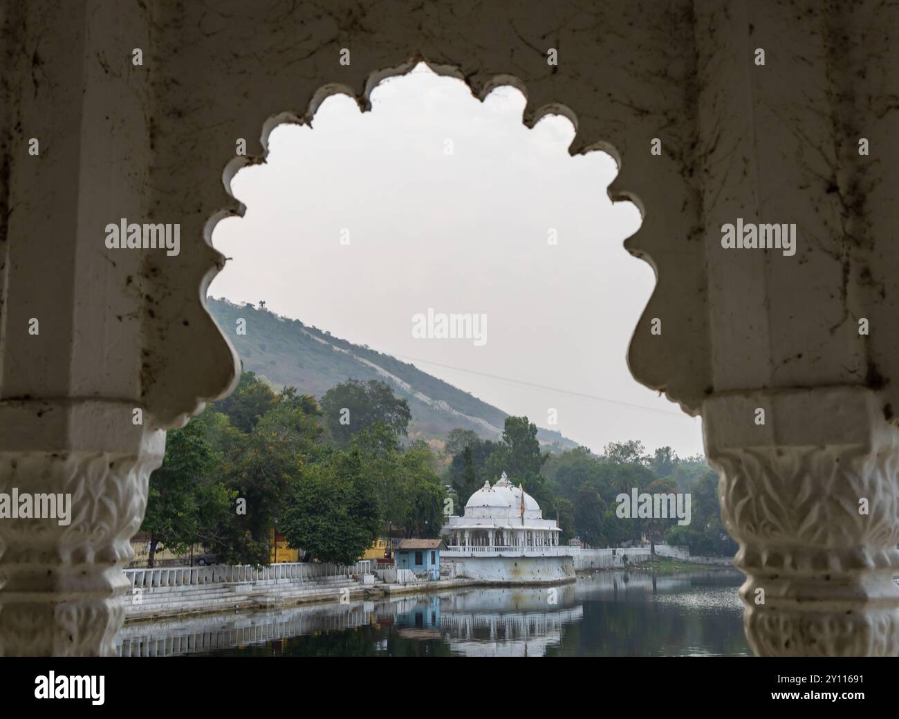 artistic city architecture with clam lake water reflection at morning ...