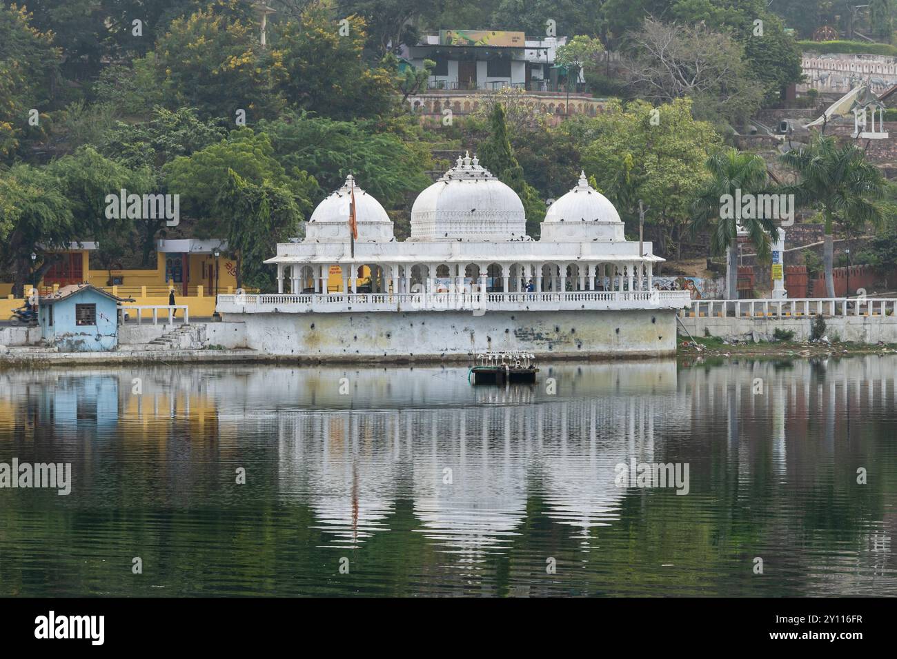 artistic city architecture with clam lake water reflection at morning ...
