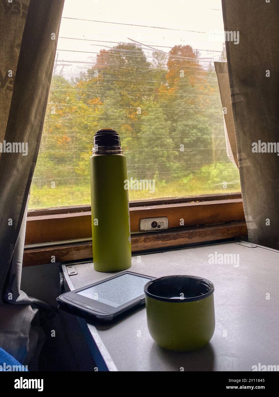 Cozy Train Compartment with Scenic View Stock Photo - Alamy