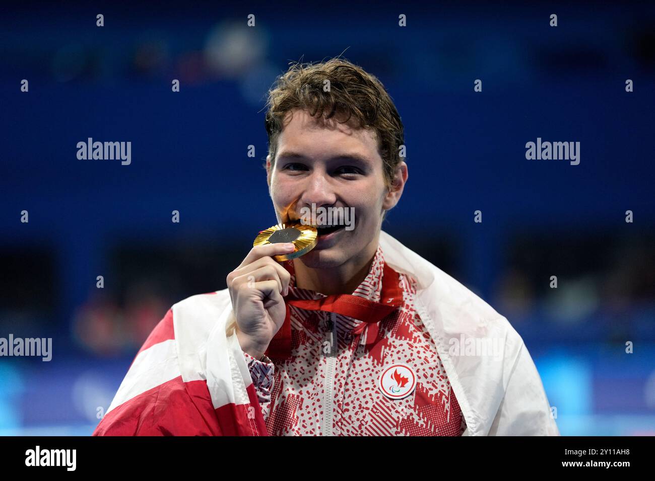 Canada's Nicholas Bennett poses with his gold medal after winning the ...