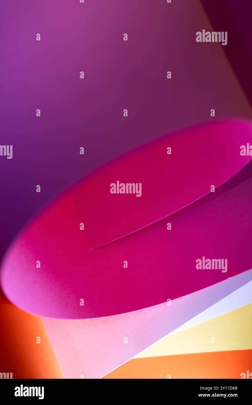 Abstract background. Rolled colorful sheets of paper. Screen backdrop ...