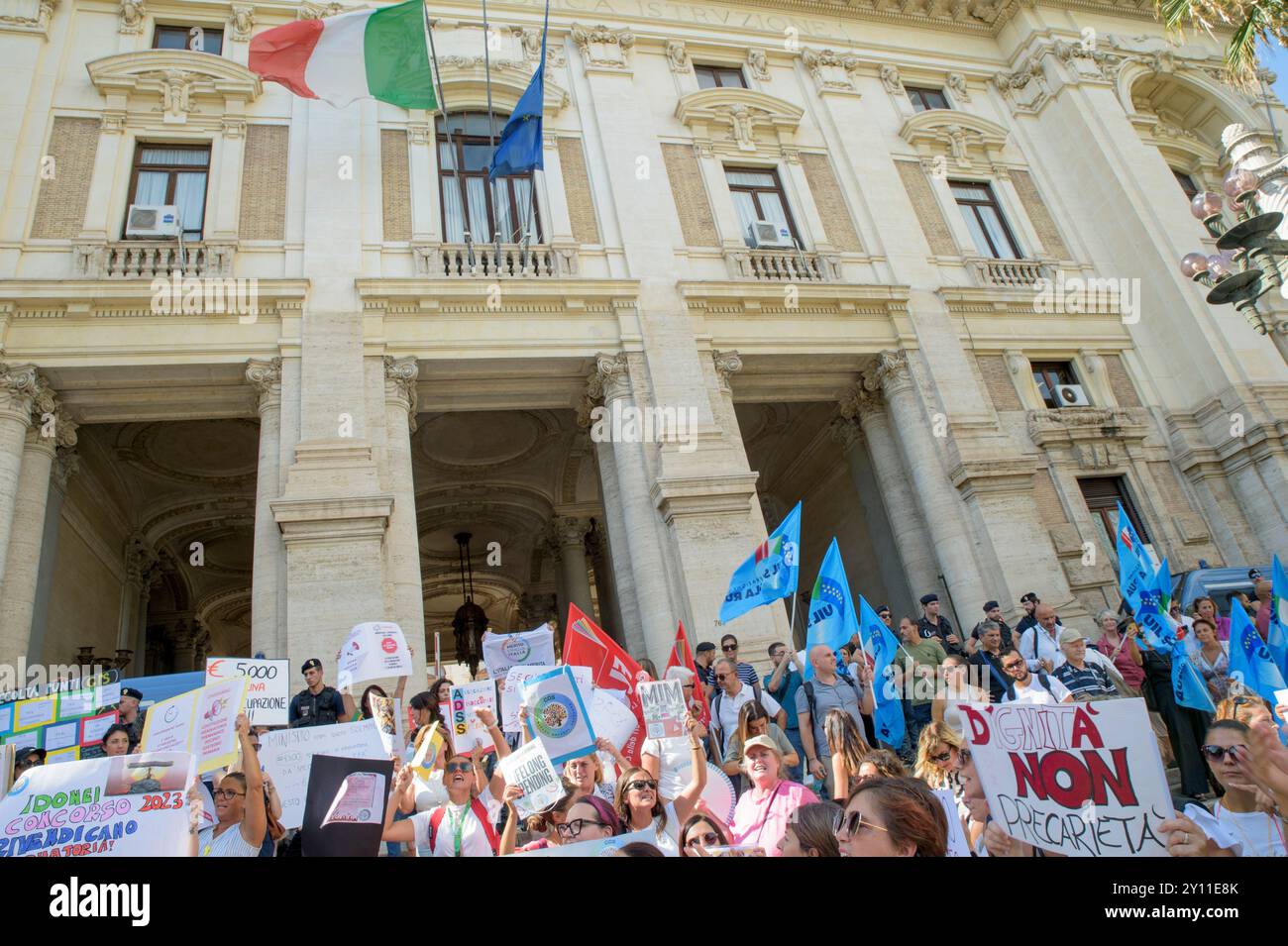 Rome, Italy. 4th Sep, 2024. A sign reading 'dignity not precariousness ...