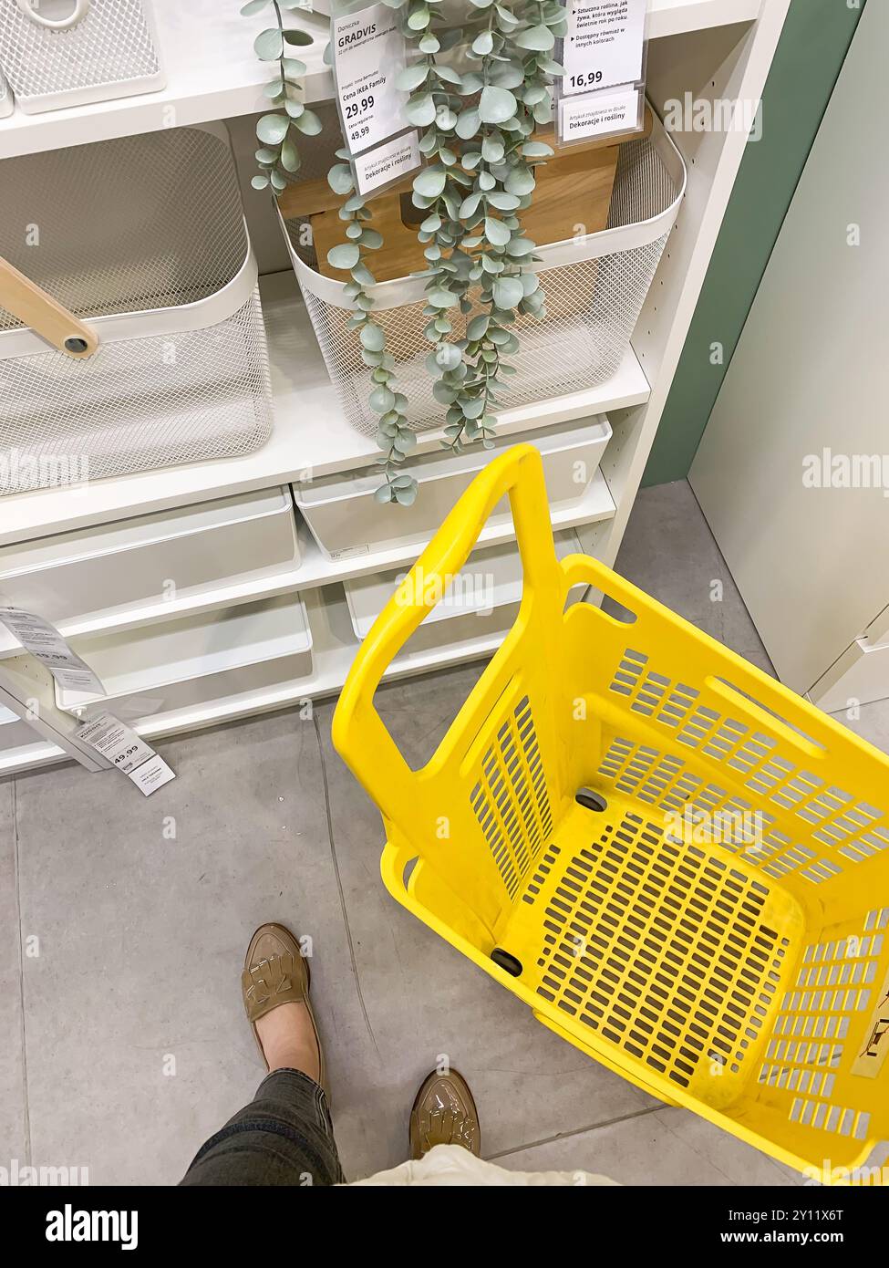 Yellow shopping cart in Ikea shop and goods exposition Stock Photo - Alamy