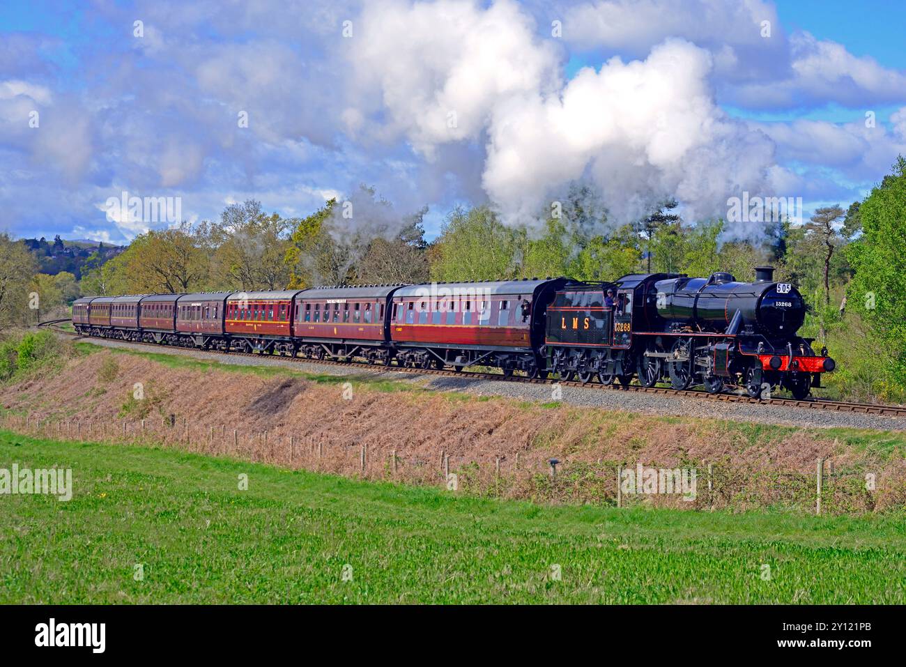 Newly overhauled LMS Mogul heads a train of period coaches past Foley ...