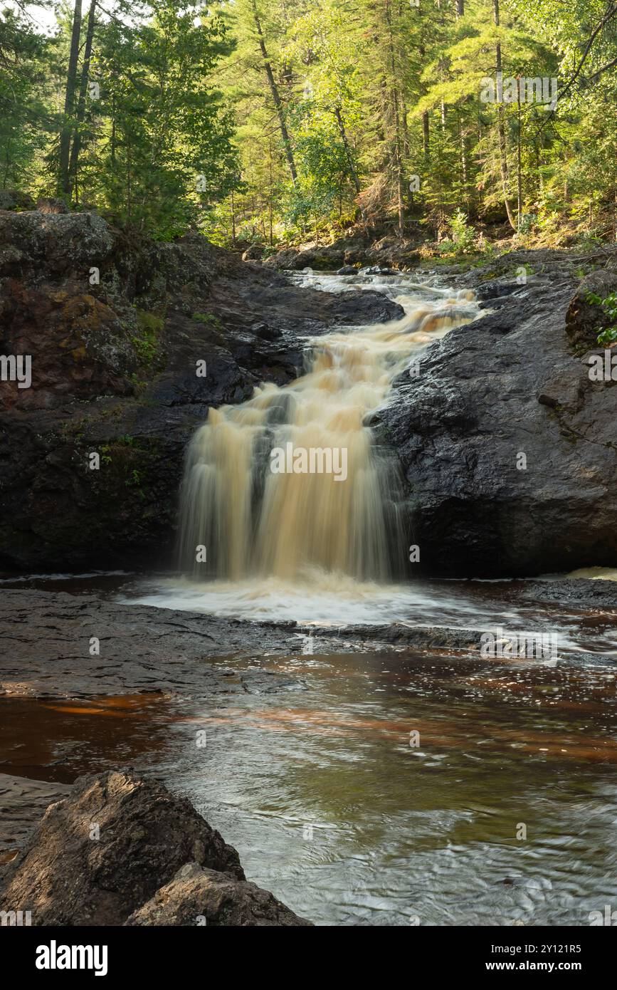 Flowing Upper Falls waterfall on a beautiful Summer morning at Amnicon ...