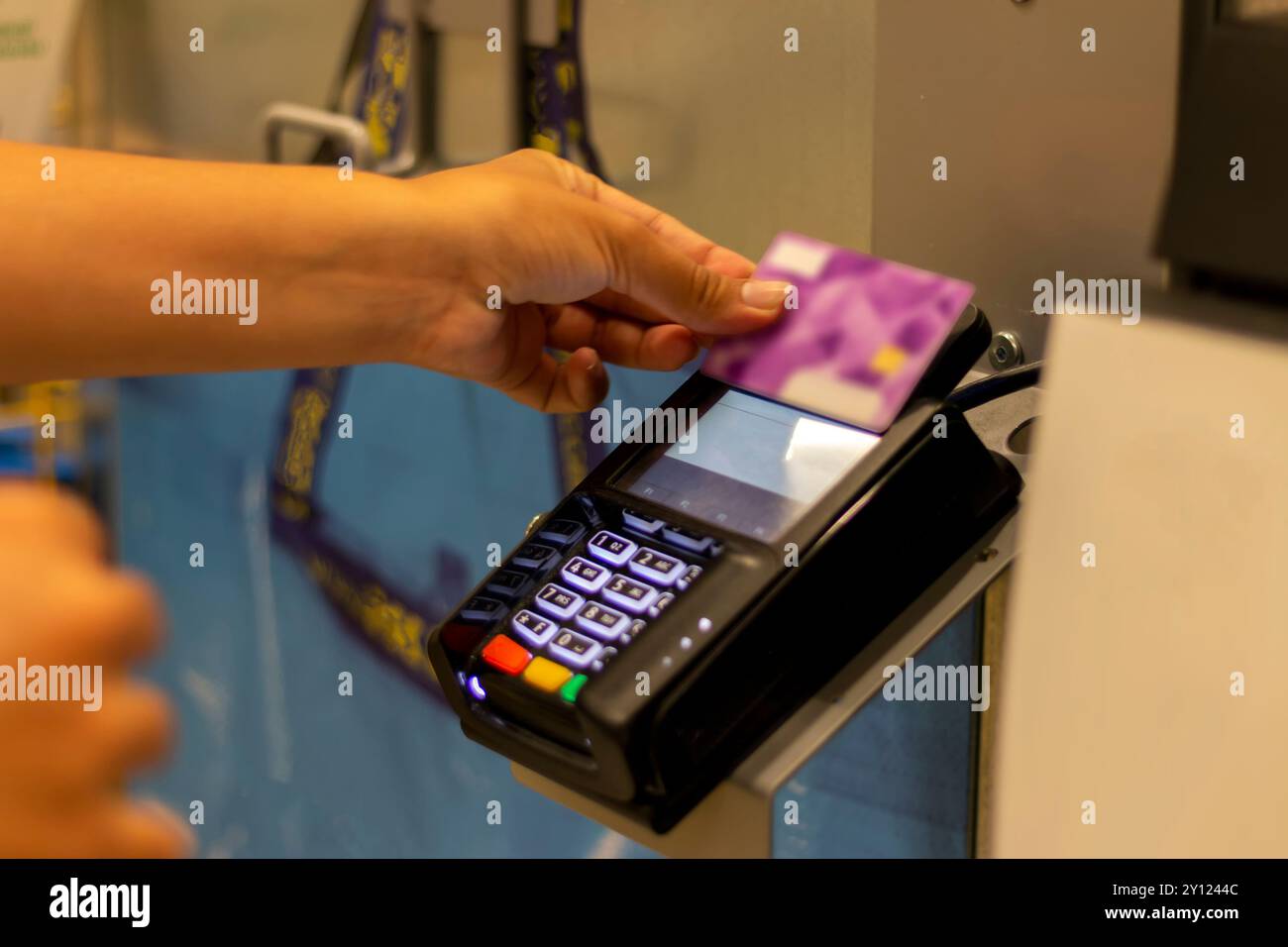 Payment with a modern contactless system Stock Photo - Alamy