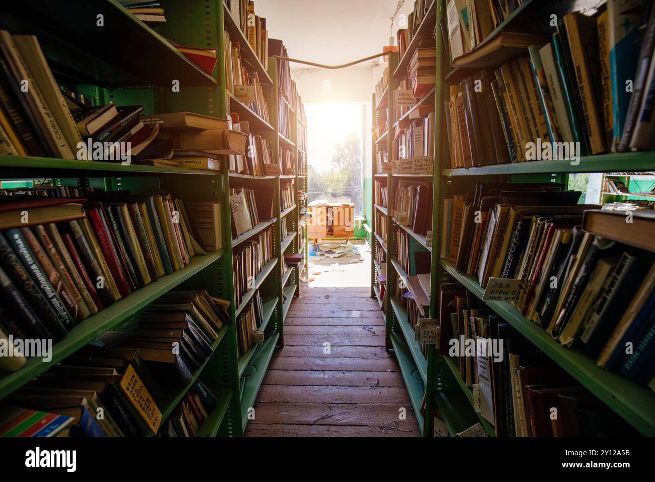 Old abandoned library, old books on shelves Stock Photo - Alamy