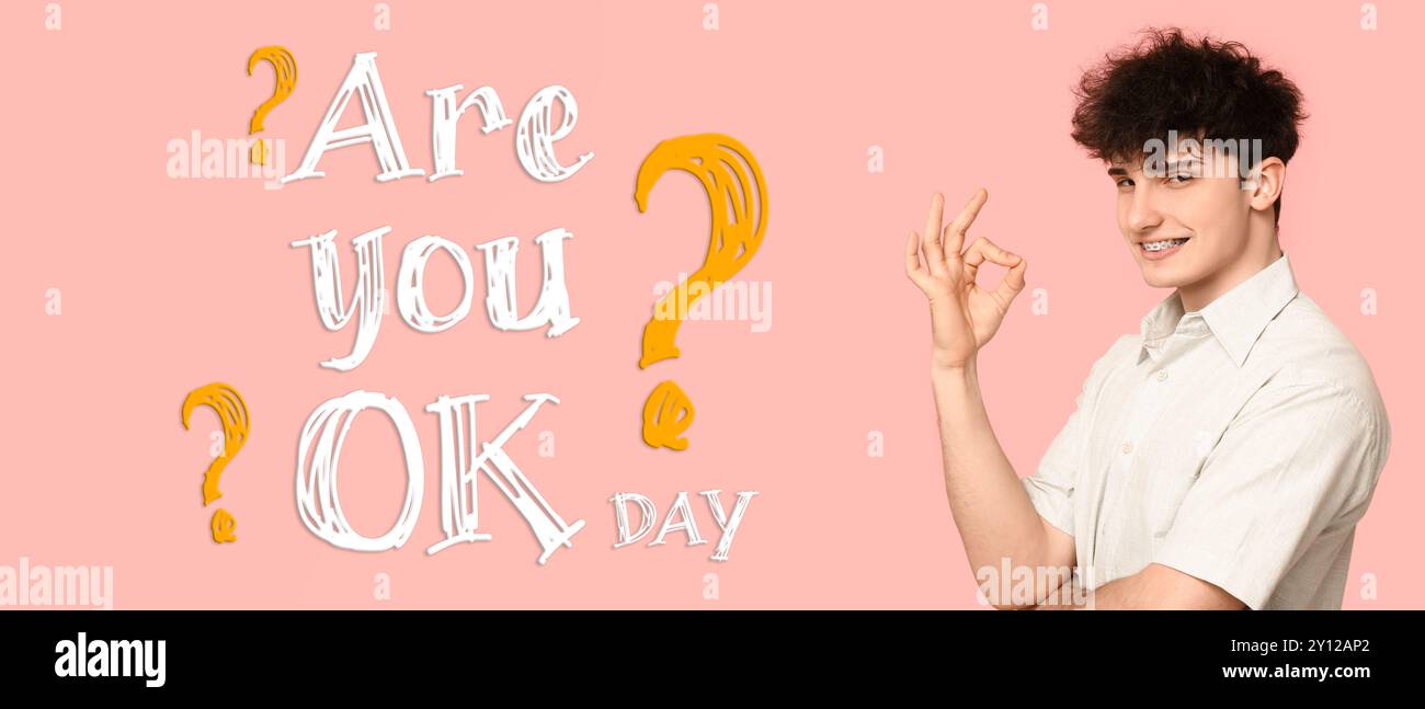 Banner for R U OK Day with young man on pink background Stock Photo - Alamy