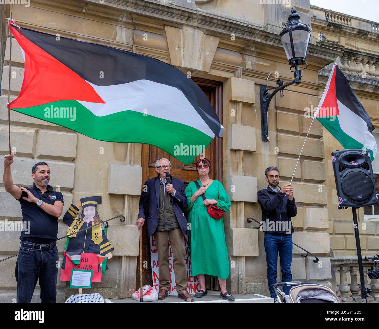 Film director Ken Loach speaks to Pro-Palestinian supporters before a ...