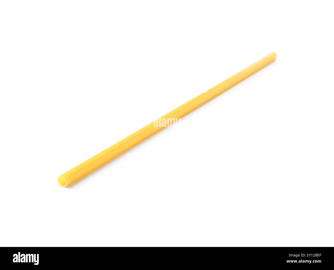 Yellow plastic straw on white background Stock Photo - Alamy