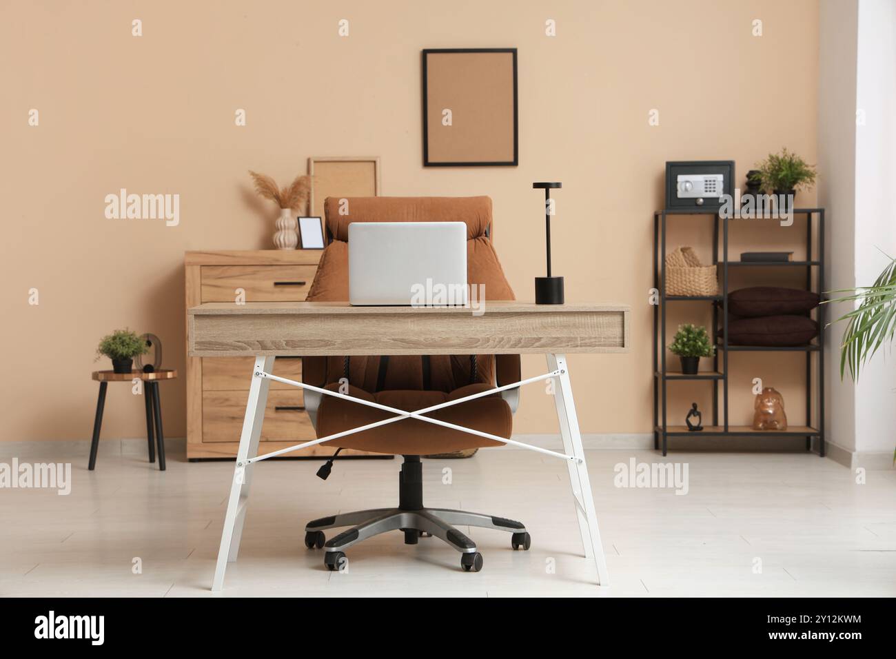 Interior of office with workplace and safe on shelf Stock Photo - Alamy
