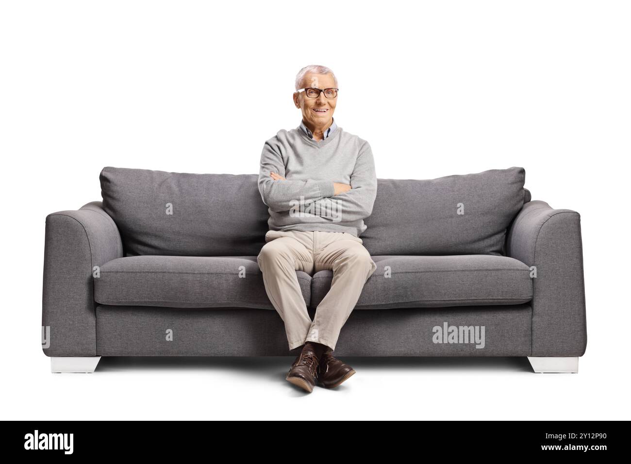 Senior man on sofa Cut Out Stock Images & Pictures - Alamy