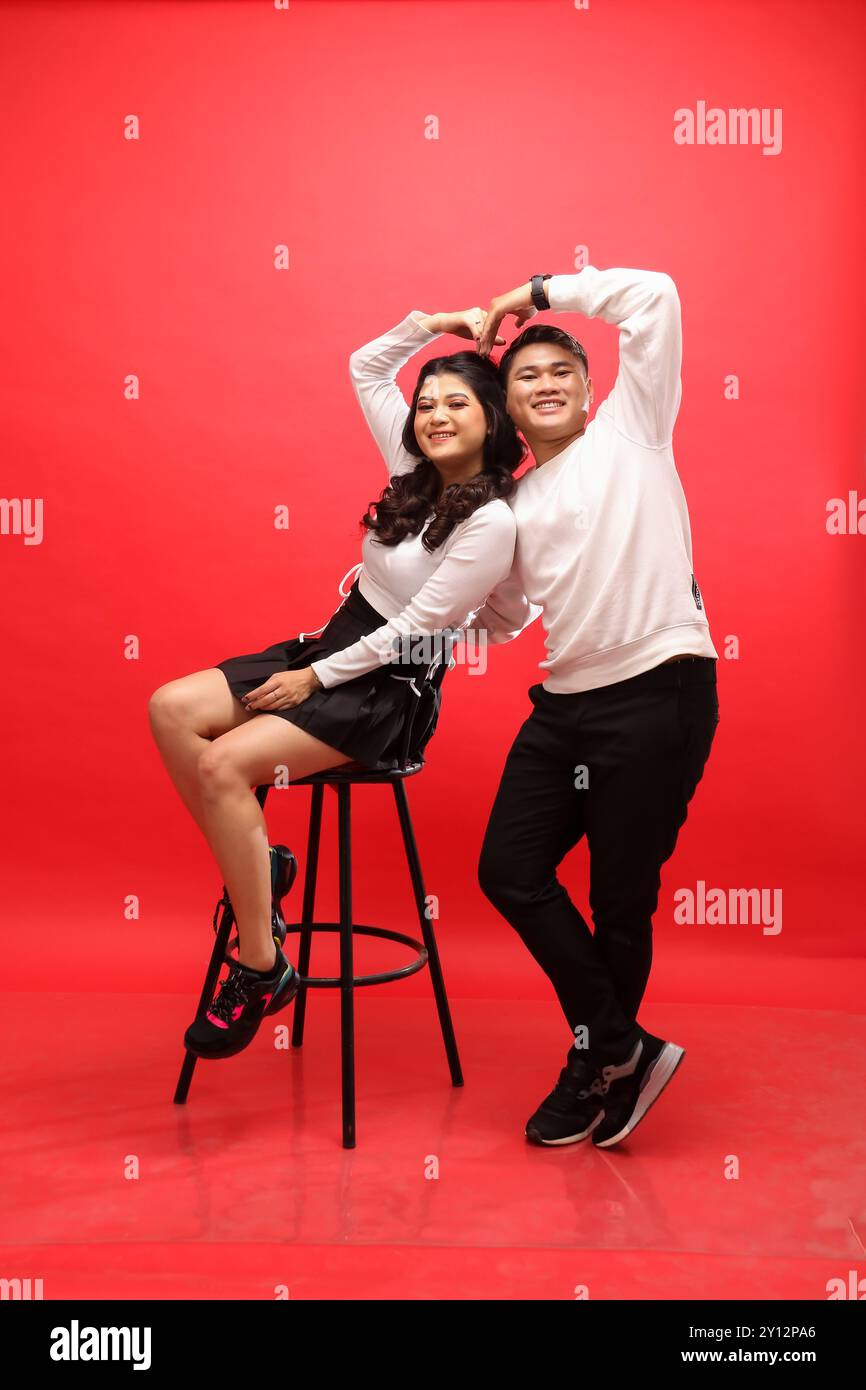 Lovers on chair hi-res stock photography and images - Alamy