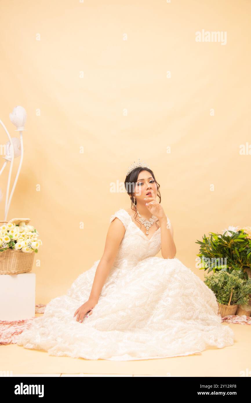elegant woman pose sitting formal relaxed cheerful looking forward ...