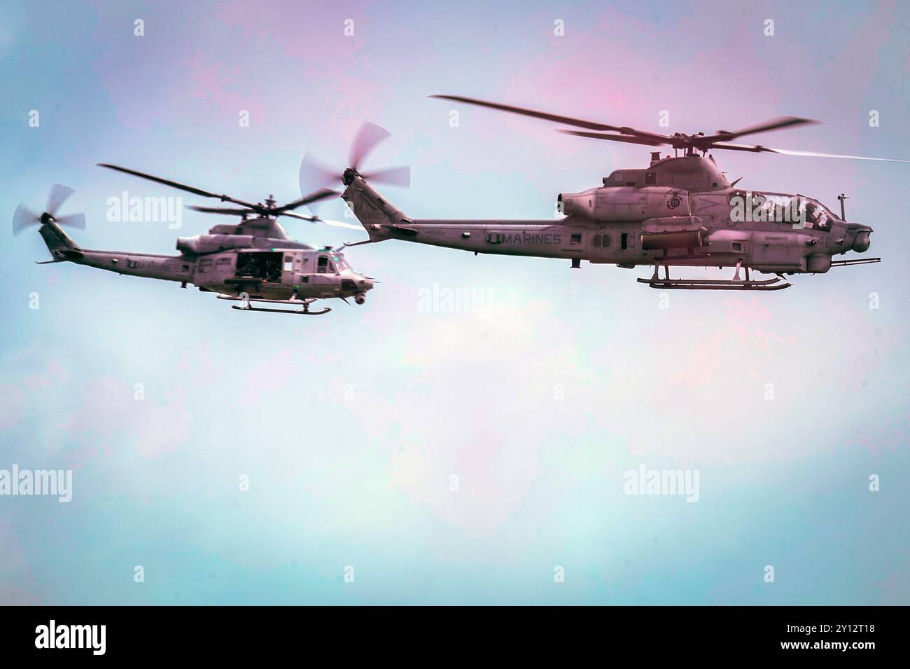 A U.S. Marine UH-1Y Venom helicopter, left, and AH-1Z Viper, assigned ...