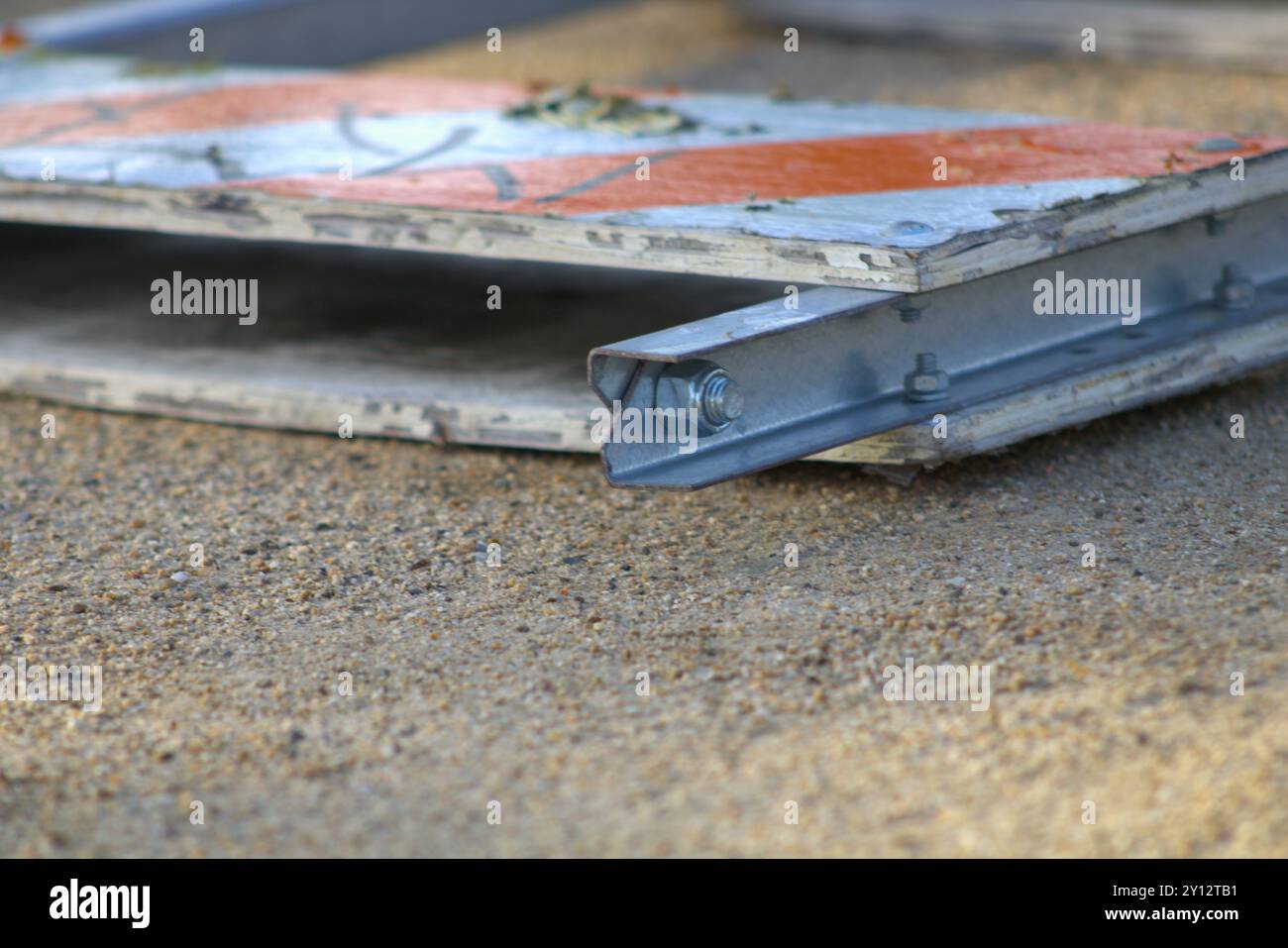 orange and white caution sign closed laying on pathway Stock Photo - Alamy
