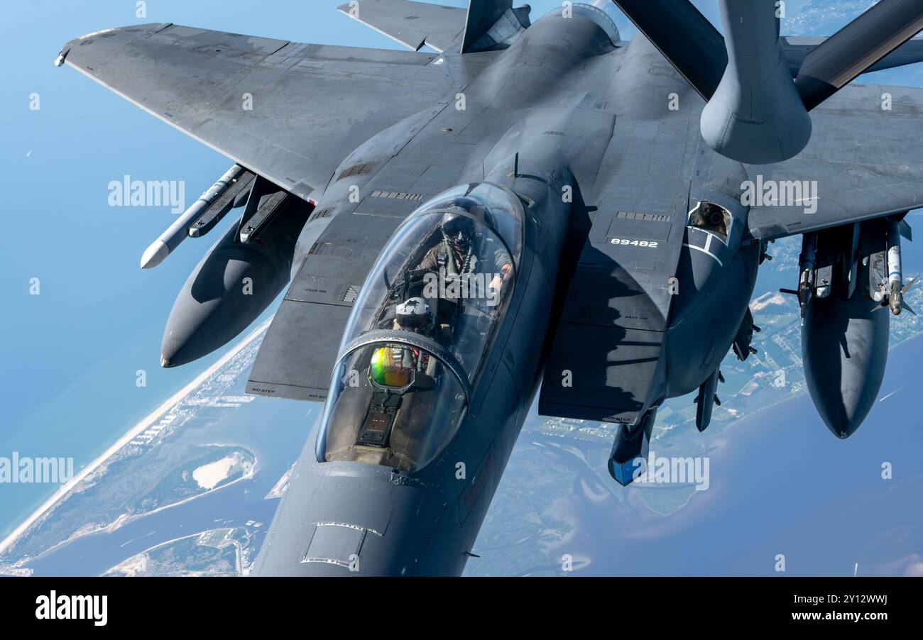A F-15 Strike Eagle, assigned to the 4th Fighter Wing, approaches a KC ...