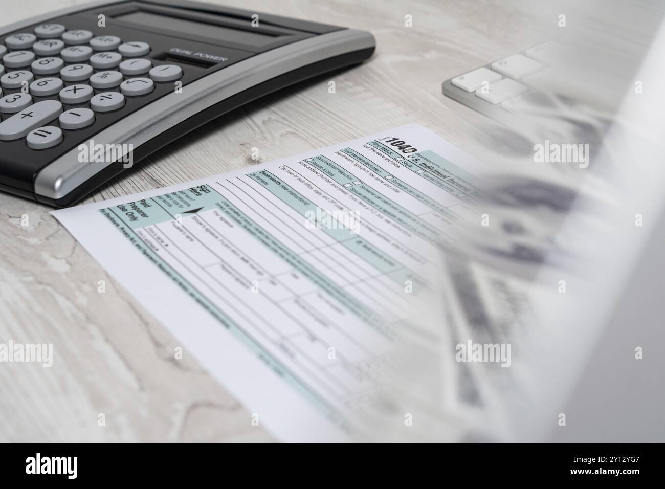 US tax form 1040 with pen and calculator. tax form law document usa ...