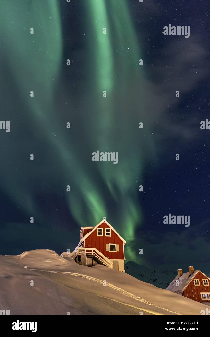 Northern Lights, Aurora borealis over red house, Inuit settlement ...