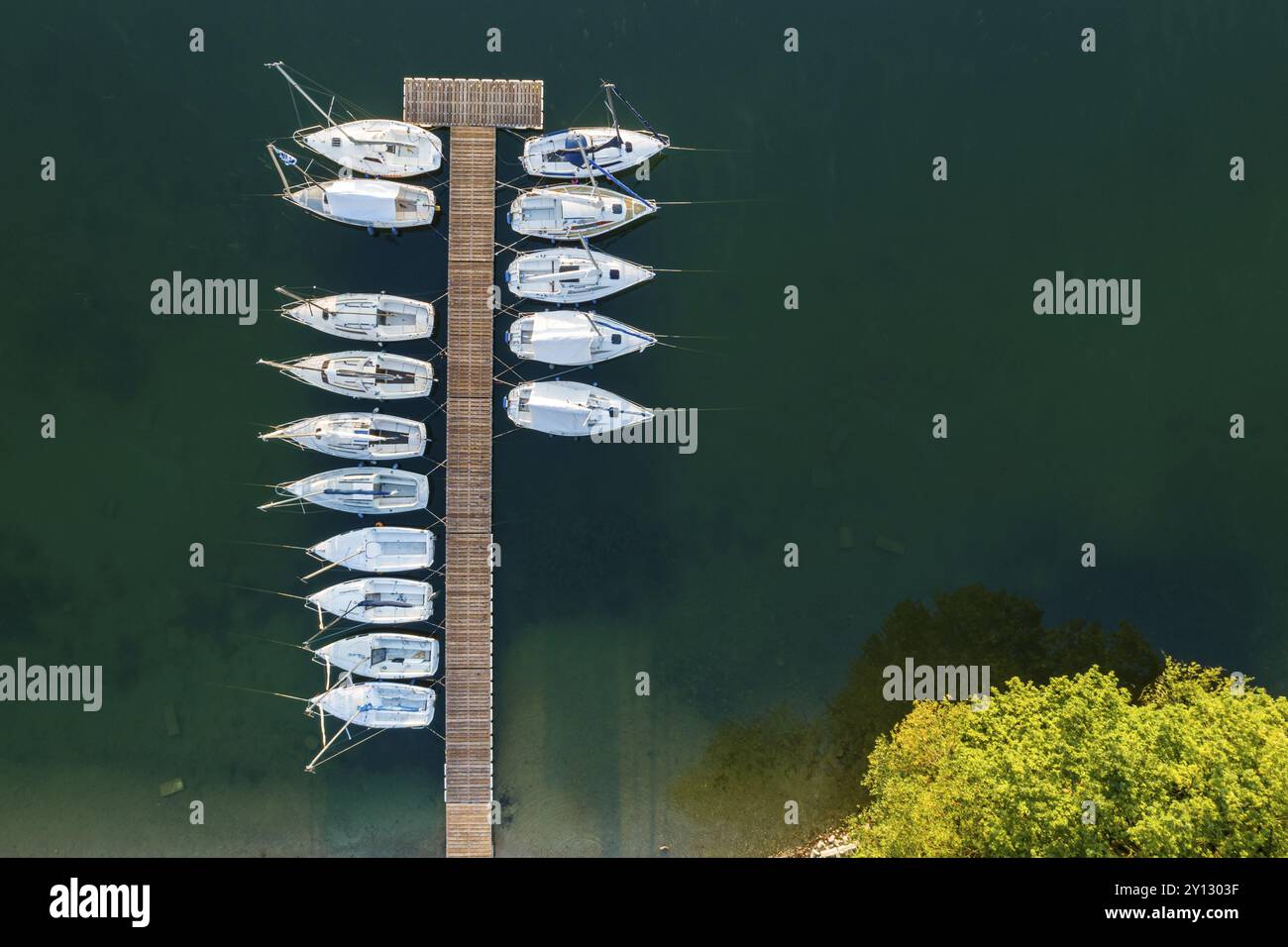 Aerial view of sailing boats on a quay in the water, autumn, Riegsee ...