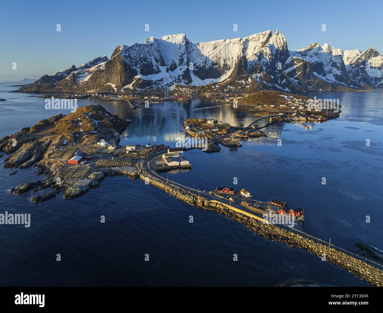 Aerial view, bridge, village, steep mountains, coast, winter, morning ...