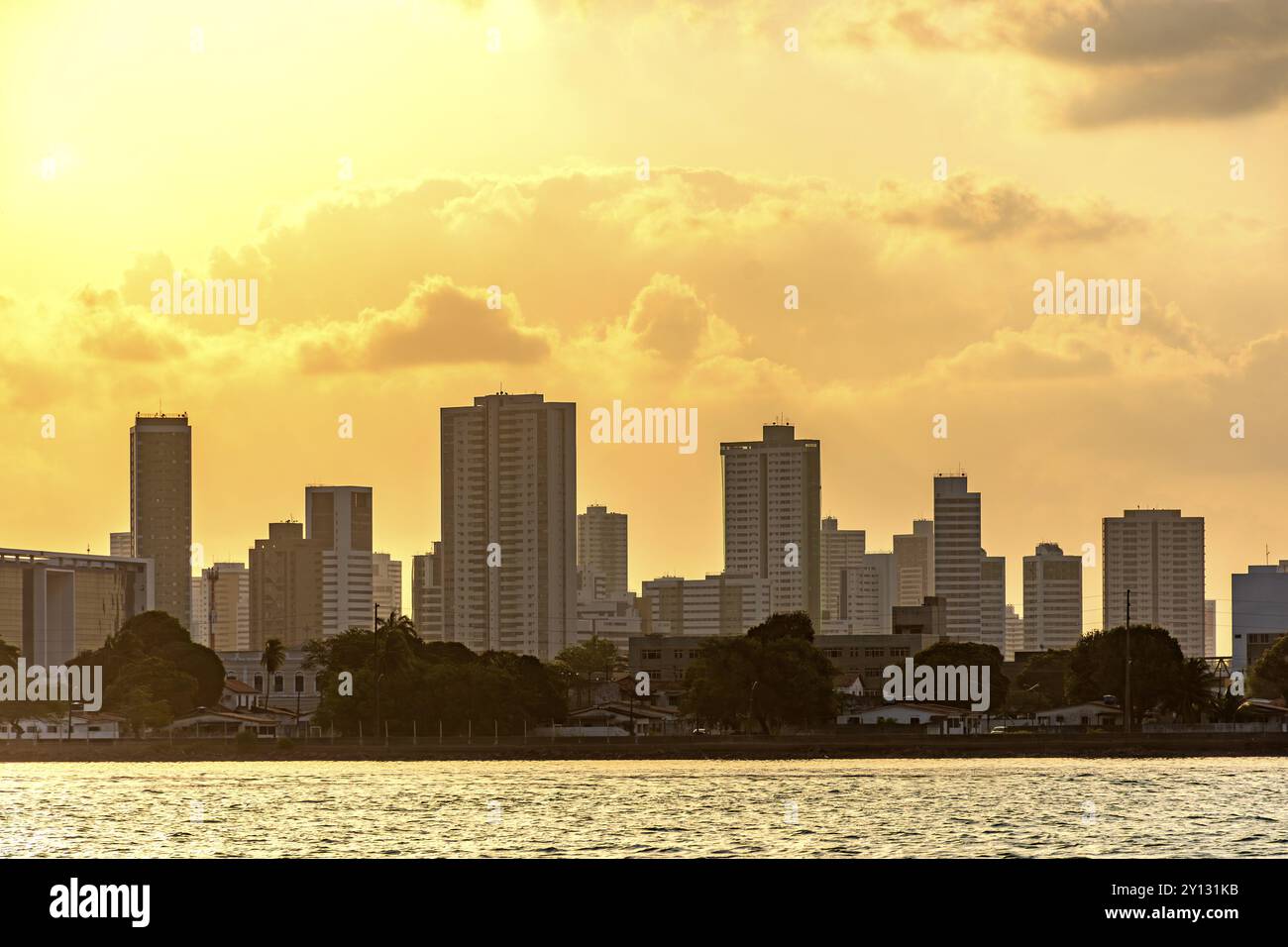 Sunset behind the skyscrapers of the city of Recife in the state of ...