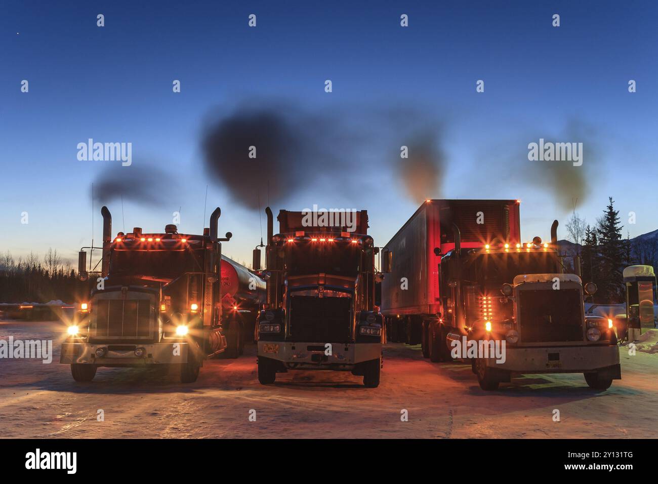 Three American trucks with engine running, truck, twilight, winter ...